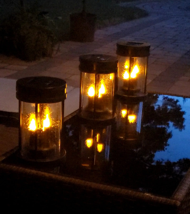 These solar candle lights are the perfect addition to our front yard ...